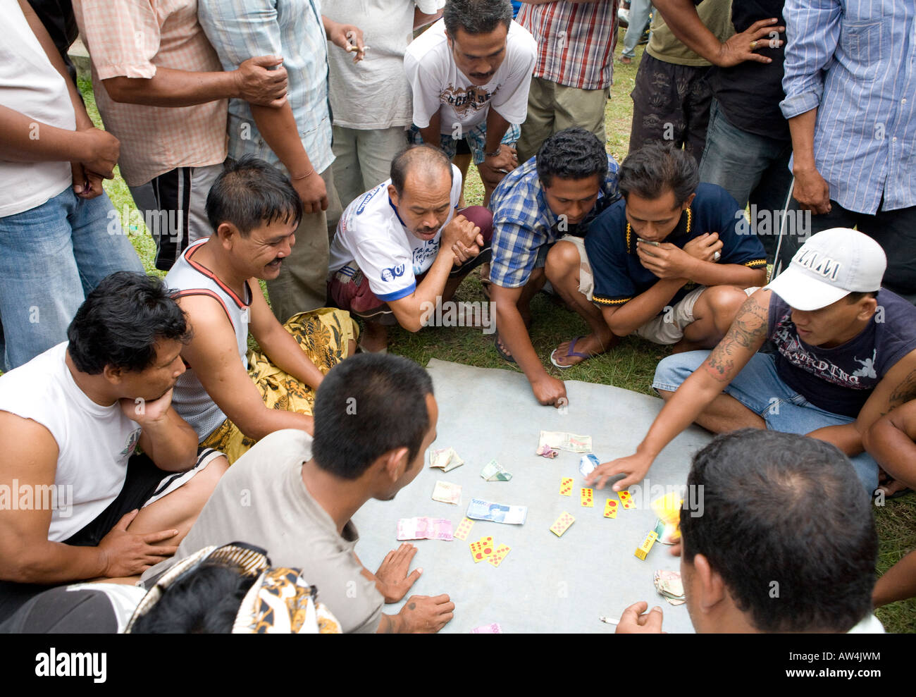 Balinese Men Gambling On Cards Ubud Bali Indonesia Stock Photo - Alamy