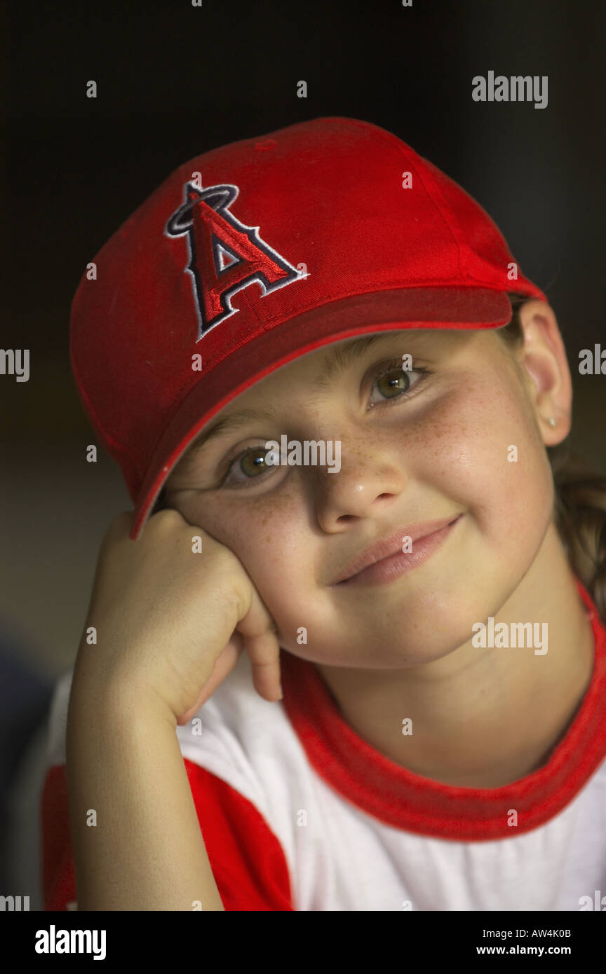 Girl baseball cap smiling hi-res stock photography and images - Alamy