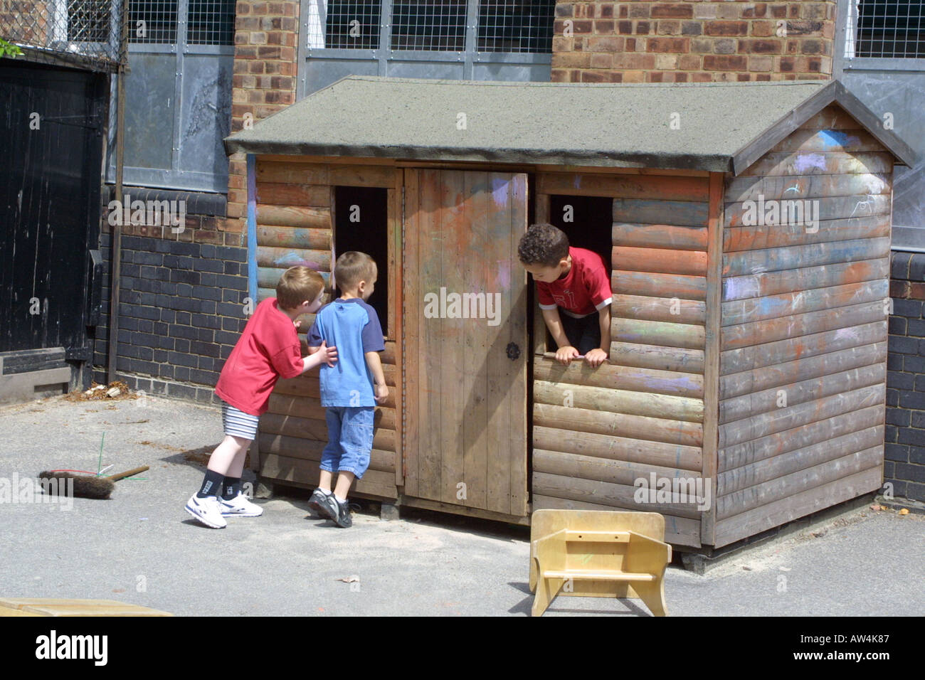 playground reception children playing in wooden toy house Stock Photo ...