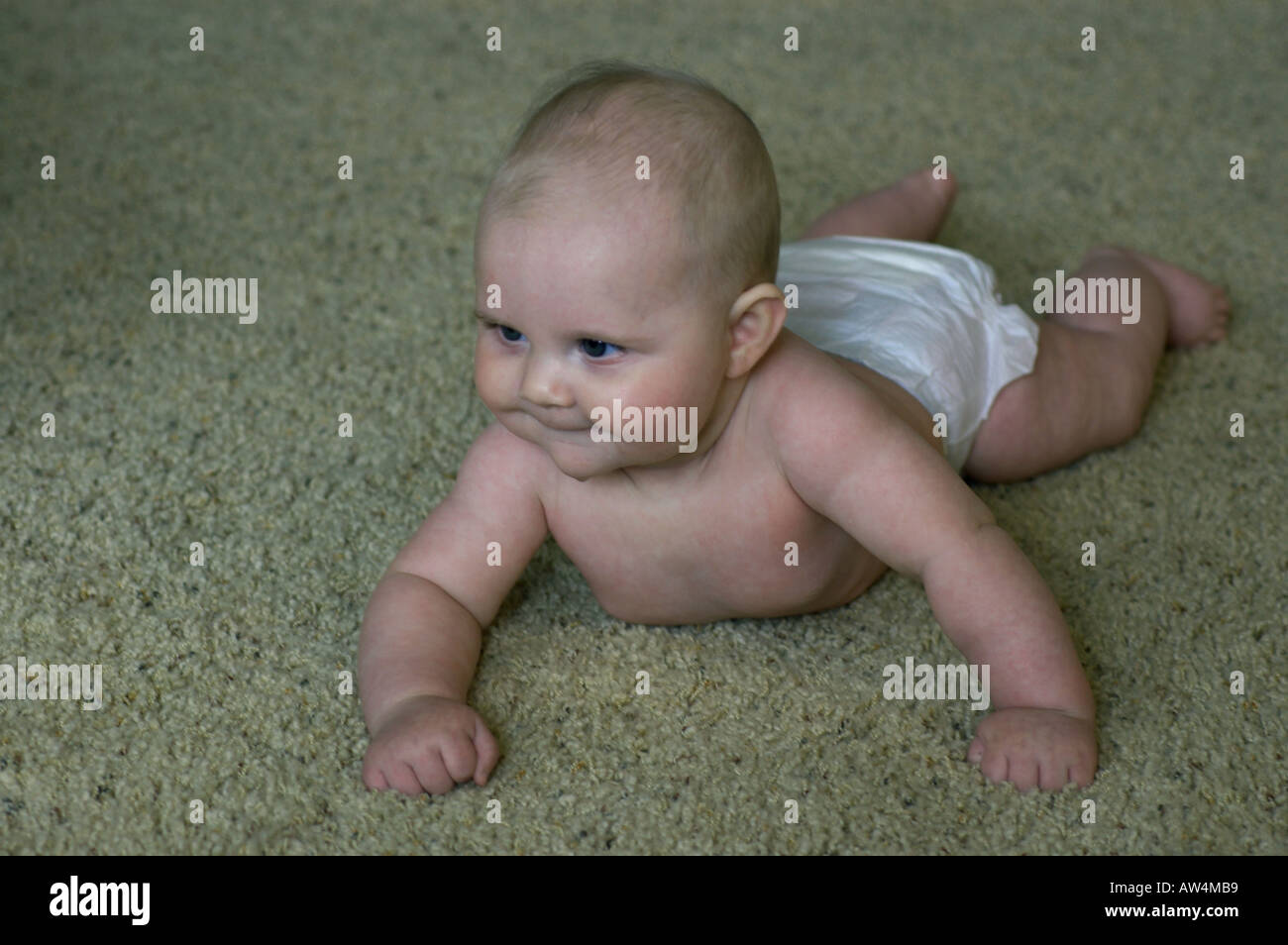 baby on rug Stock Photo - Alamy