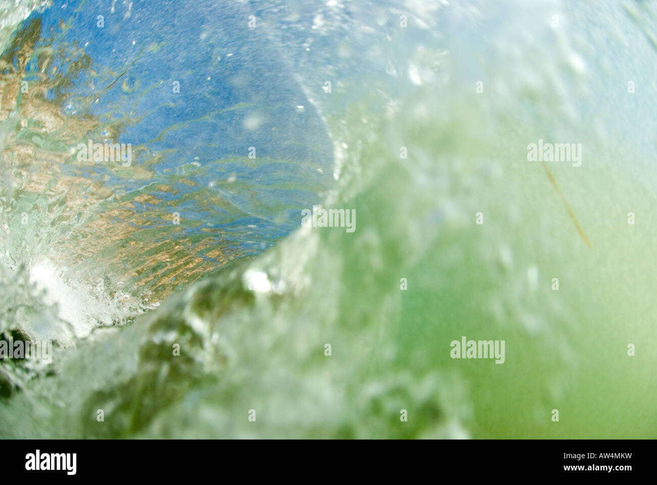 Inside of a wave breaking Stock Photo - Alamy