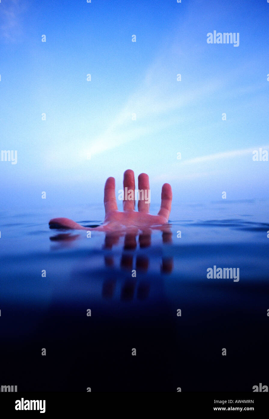 A hand rising out of the water Stock Photo - Alamy