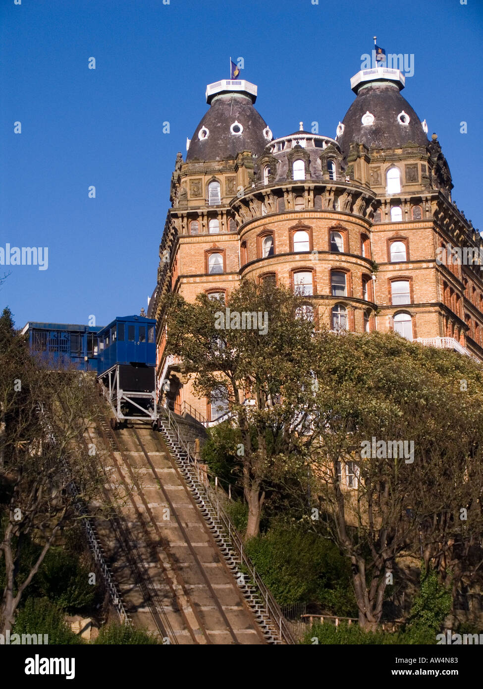 Victorian era vernicular rail tram and Grand Hotel Stock Photo - Alamy