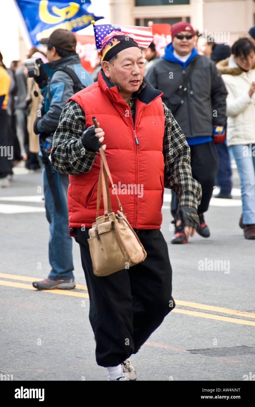 Man throwing firecrackers in the Chinese New Year Parade in downtown ...