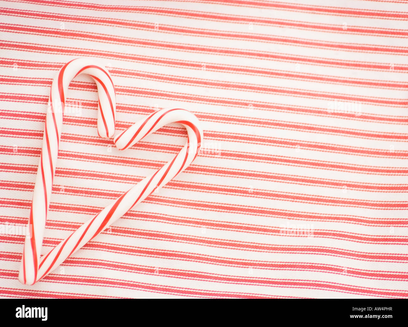 Two candy canes making a heart shape Stock Photo - Alamy
