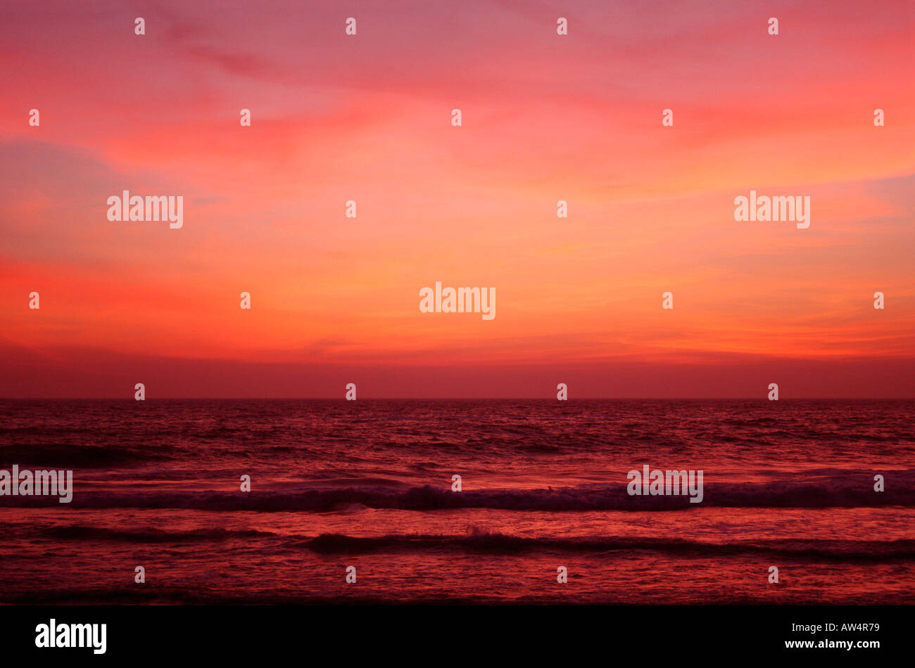 Beautiful sunset at a beach Stock Photo - Alamy