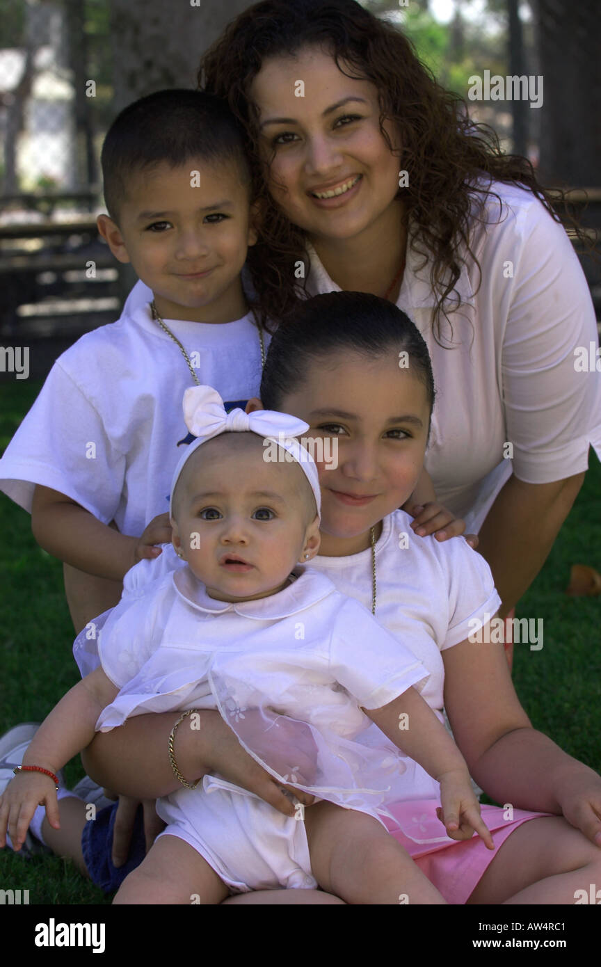Hispanic mother and children Stock Photo - Alamy