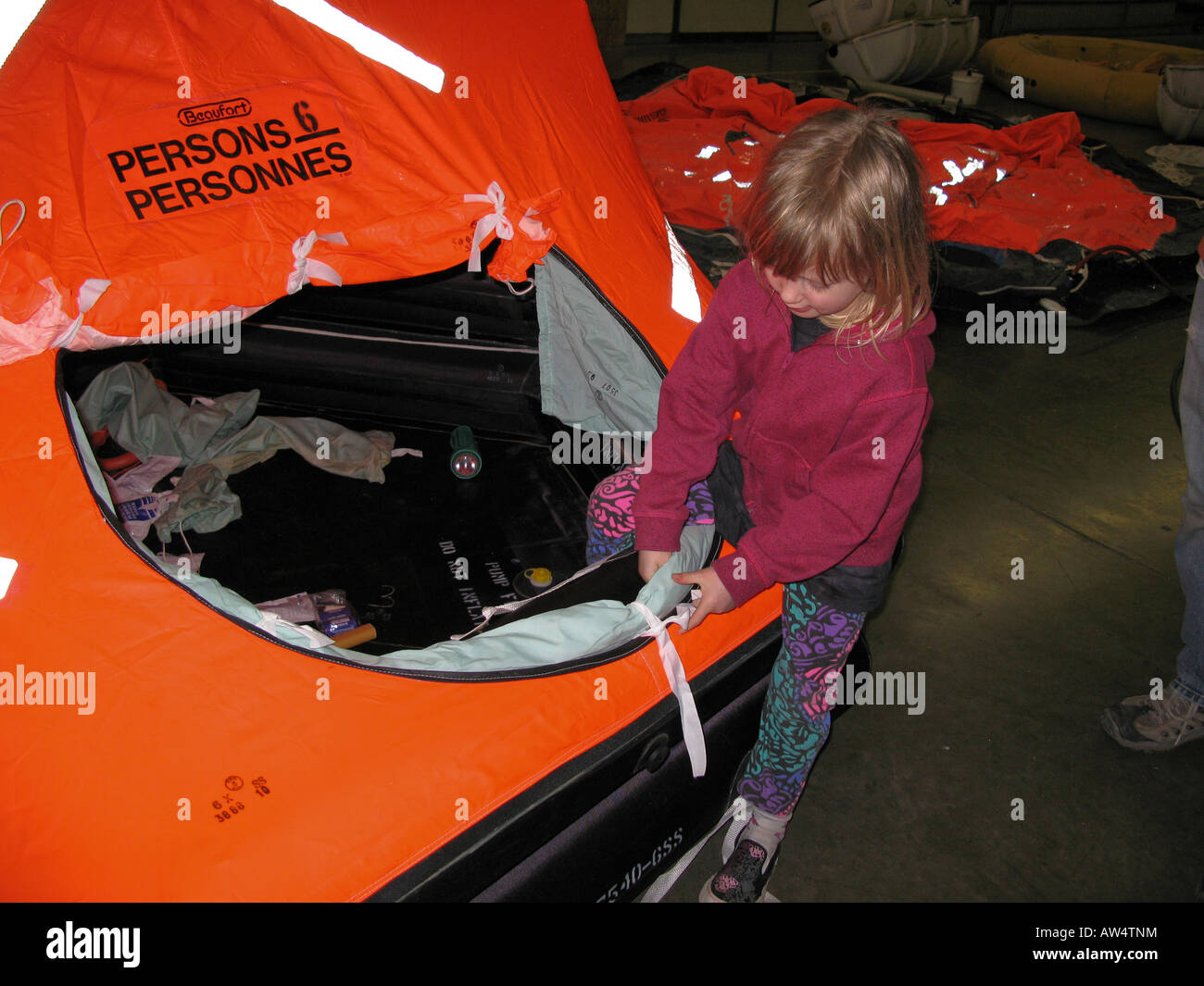 Checking emergency ocean life raft Richmond, BC, Canada Stock Photo - Alamy