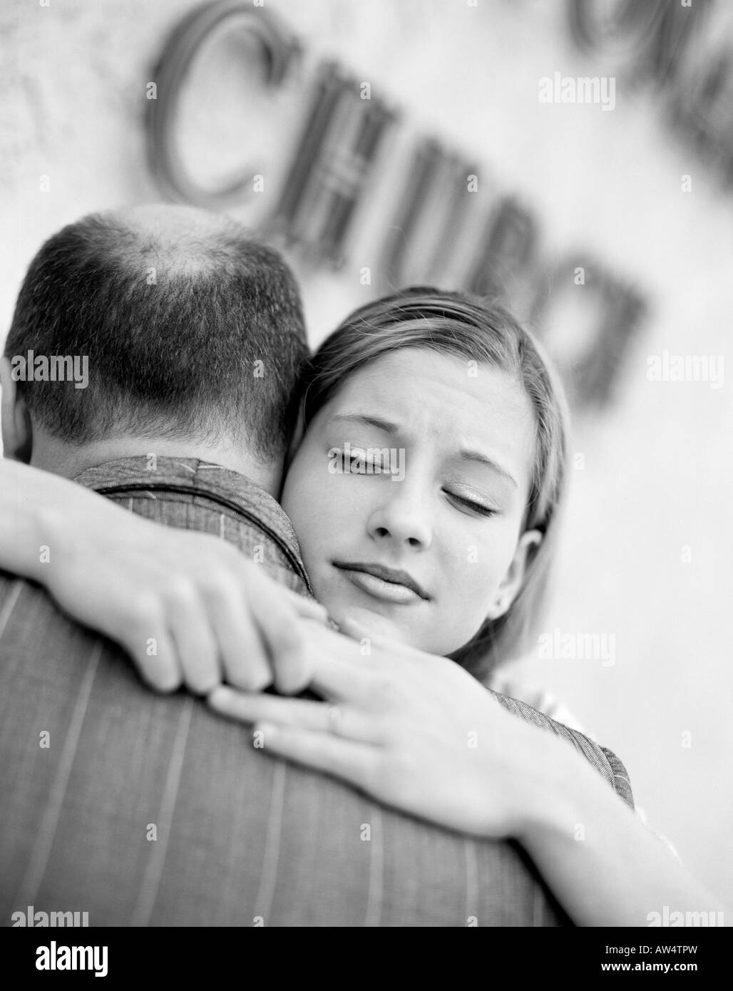 Daughter hugging father Stock Photo - Alamy