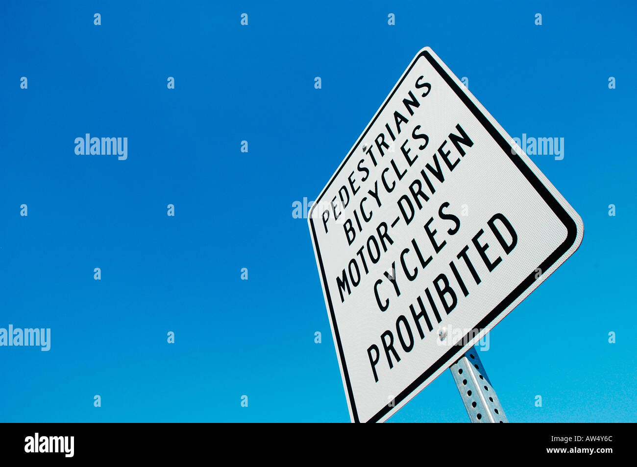Signs for drivers of trucks, cycles, and pedestrians warning them to ...