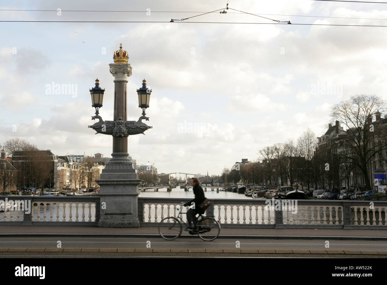 A decorative lamppost on a bridge in Amsterdam Stock Photo - Alamy