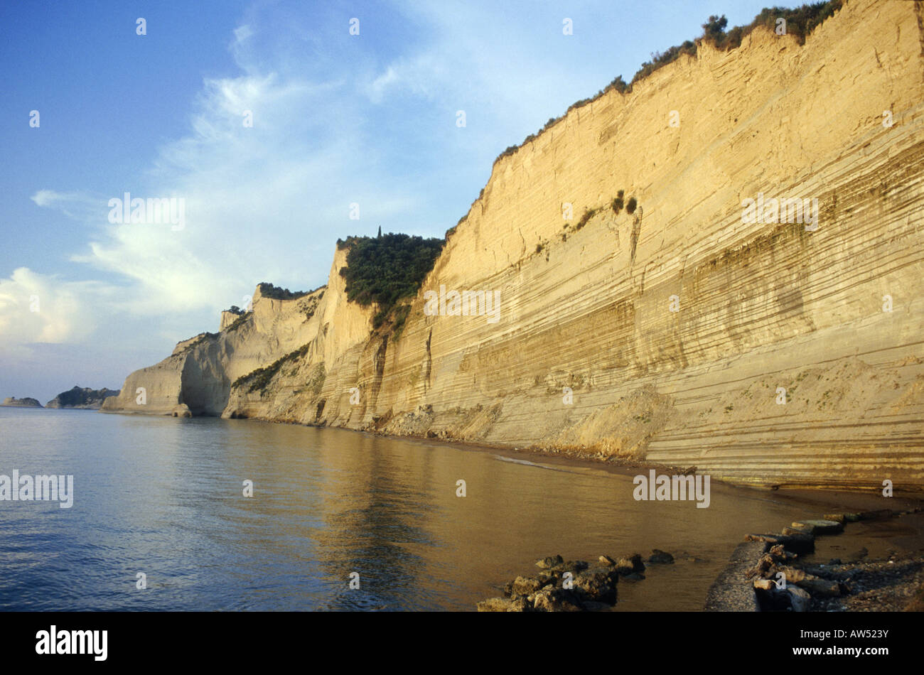 Ionian Island Sheer red sandstone cliffs Layers geological seams Sea ...