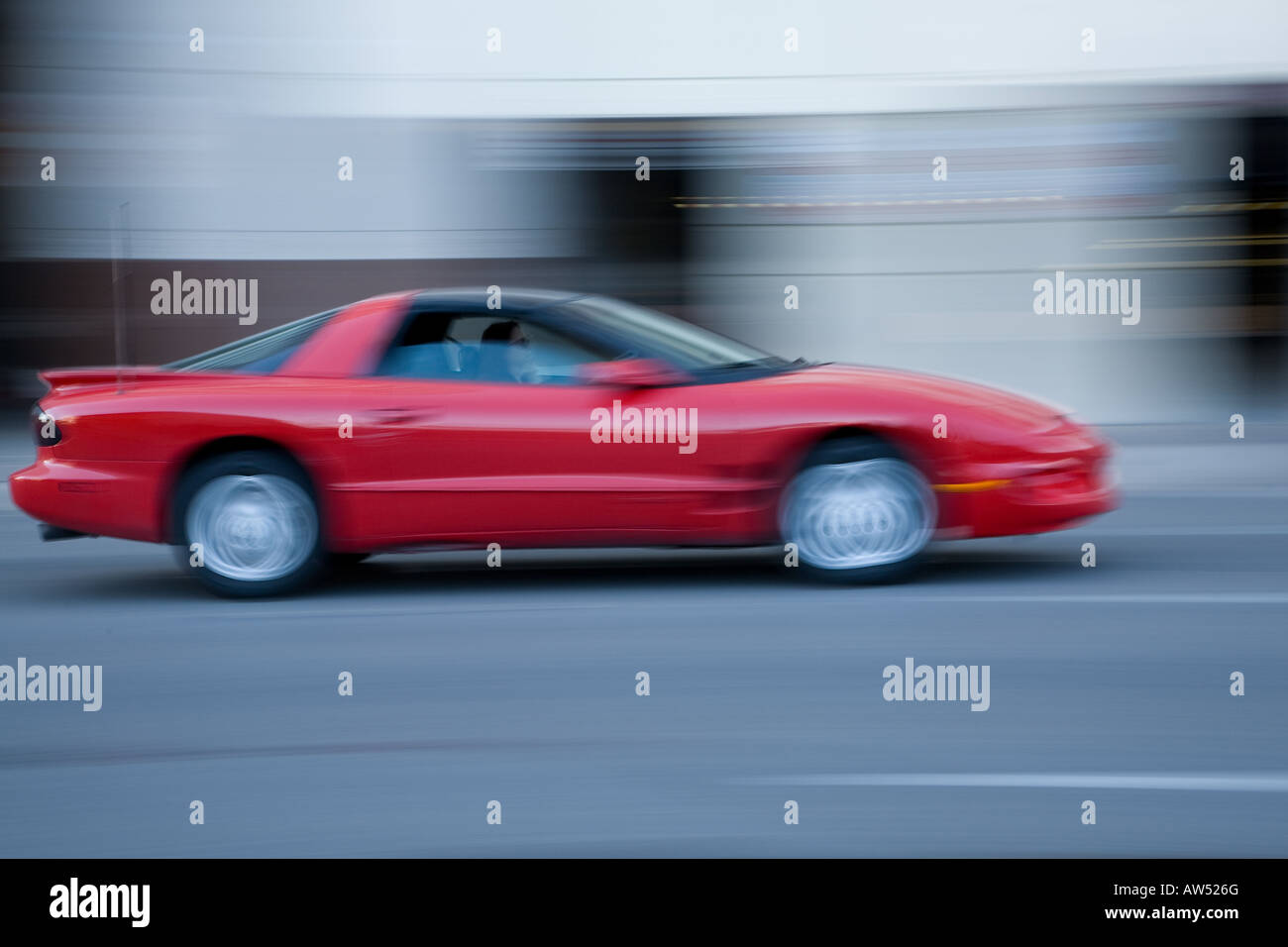 High Speed - red sportscar Stock Photo - Alamy