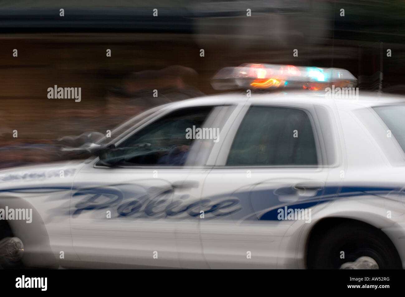 Police car in motion Stock Photo - Alamy