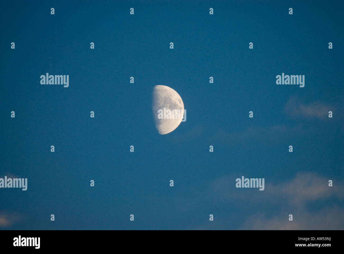 Moon in earlier evening sky Stock Photo - Alamy