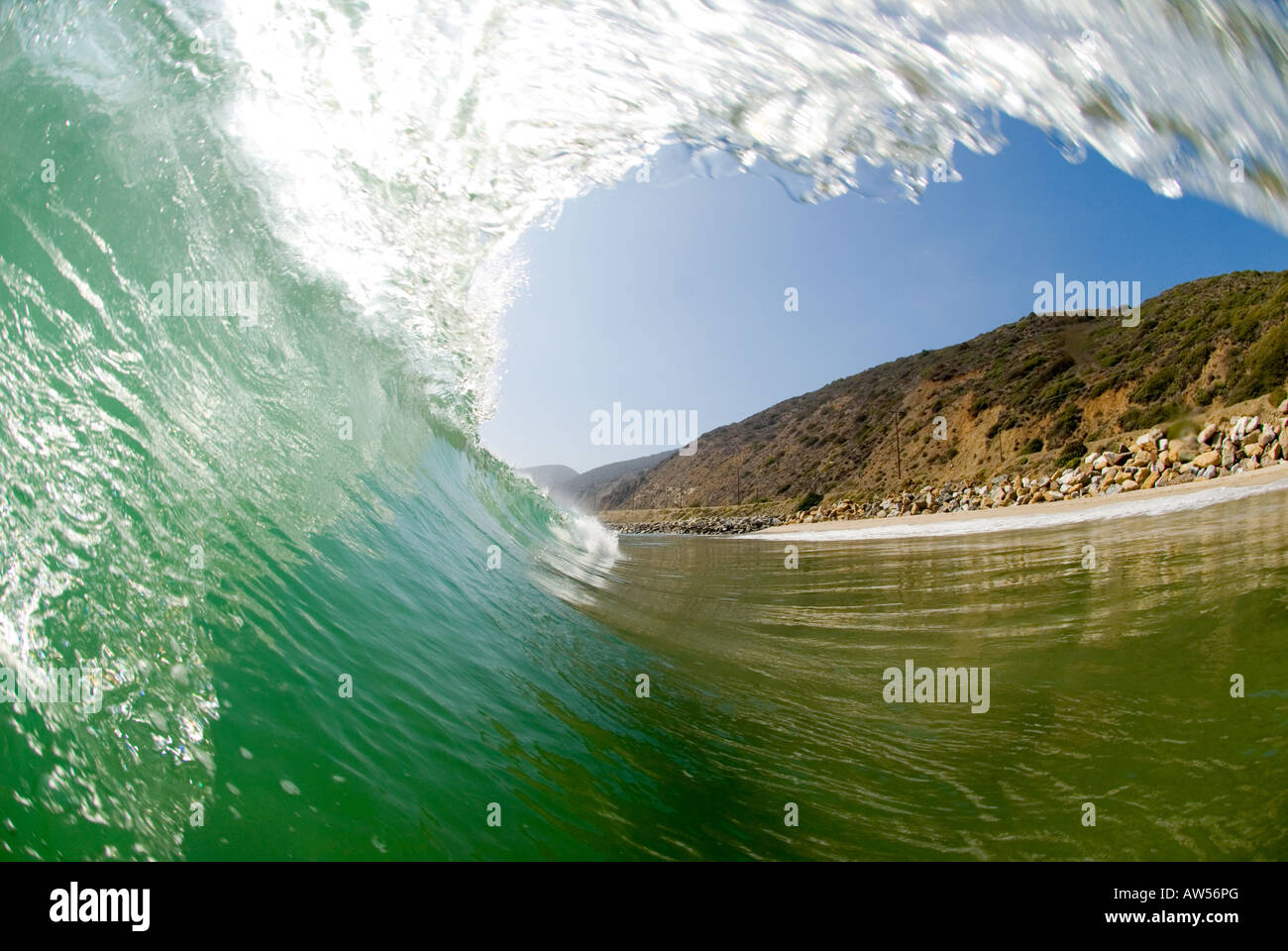 Inside of a wave breaking Stock Photo - Alamy