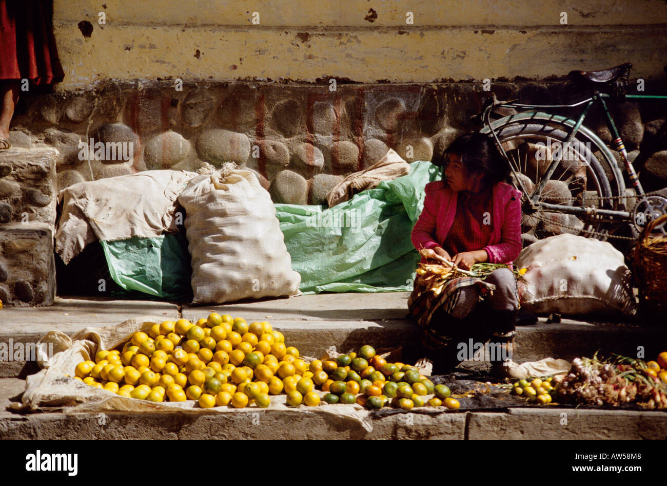 Peruvian woman working at street market bei cusco, Peru Stock Photo - Alamy