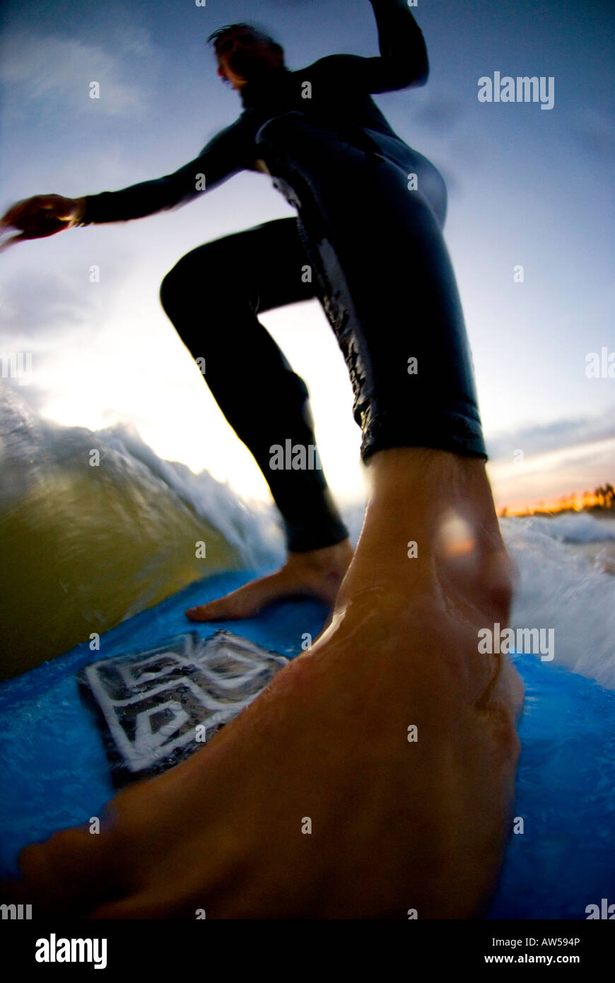 A surfboard mounted camera of a surfer surfing Ventura California USA ...