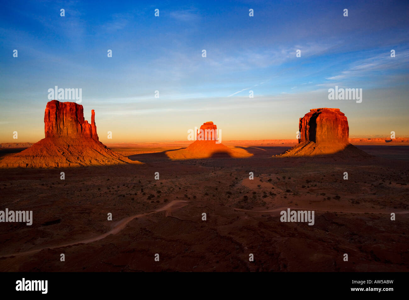 Sunset over the Mittens Monument Valley Southern Utah USA Stock Photo ...