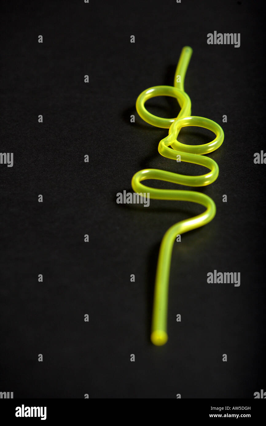 A yellow bendy straw in the studio Stock Photo - Alamy