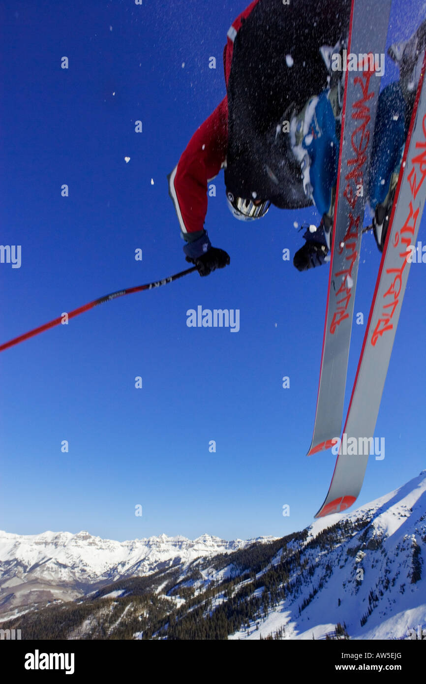 Skier jumping off cornice on Bald Mountain in Telluride ski area, San ...