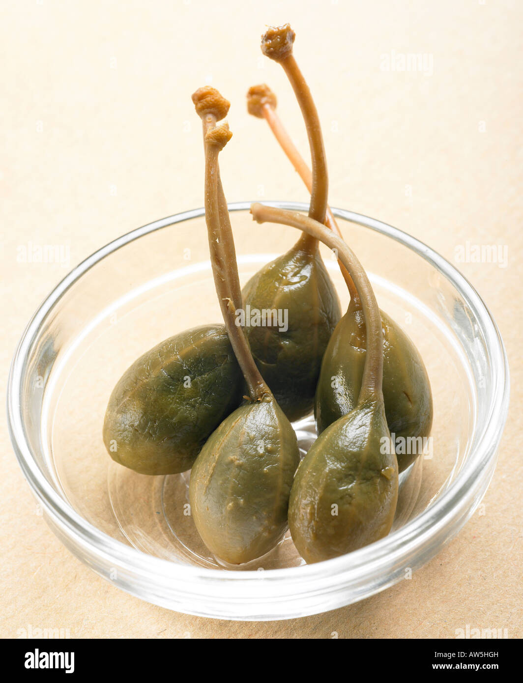 caper berries from plant Capparis spinosa in glass round dish Stock ...