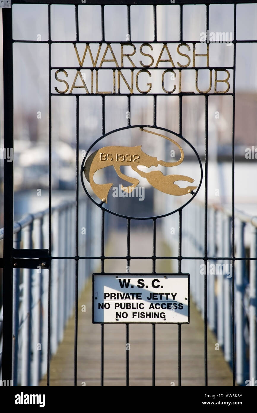 Warsash sailing club gate to jetty Stock Photo - Alamy