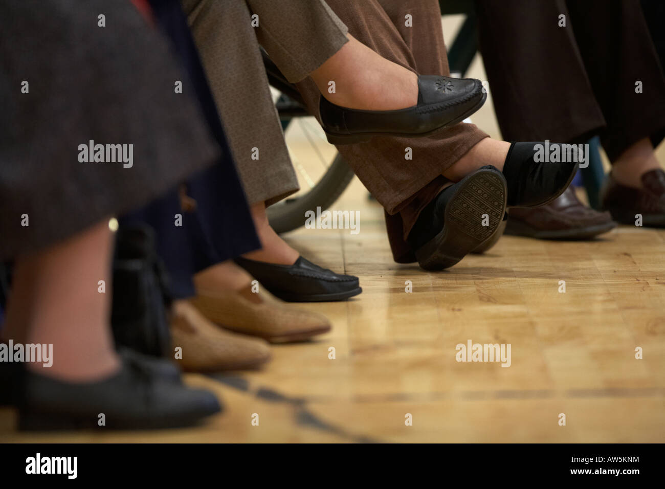 feet and shoes of old age pensioners on a gym hall floor Belfast Stock ...
