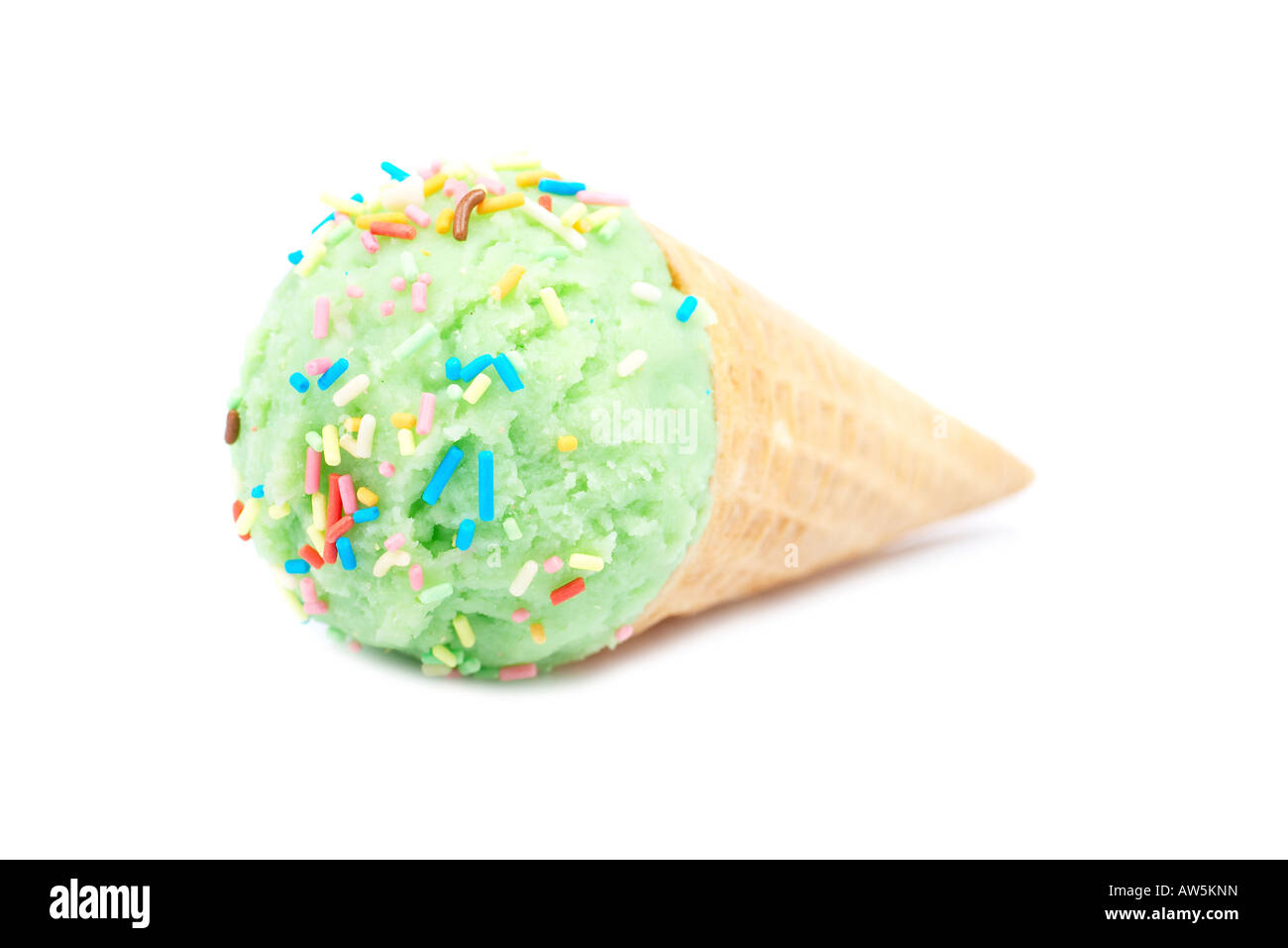 Delicious ice cream cone with soft shadow on white background Shallow ...