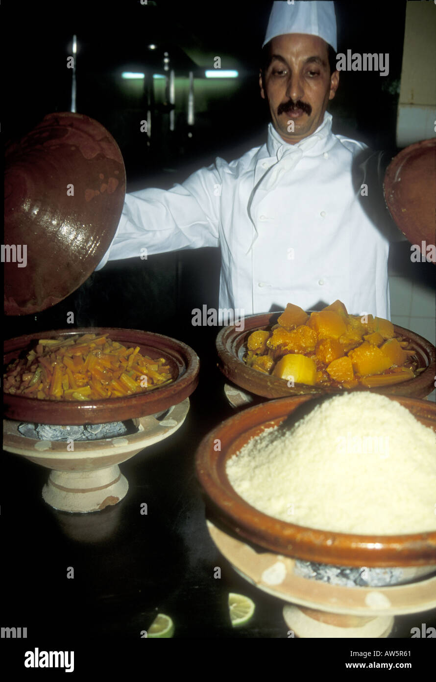 A chef presenting cous-cous at a restaurant in Morocco Stock Photo - Alamy