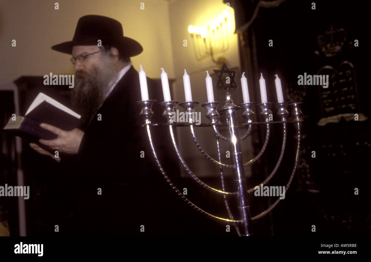 Orthodox Rabbi with eight branch menorah Stock Photo - Alamy