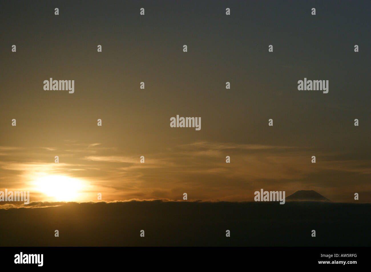 Mount Fuji (at right of frame) from a distance at sunset. Japan Stock ...