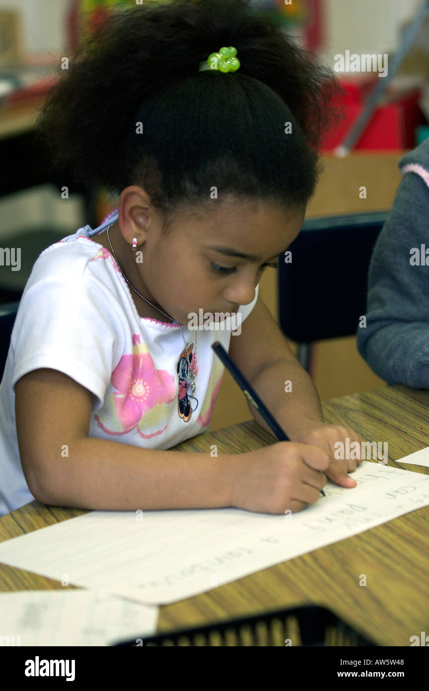 young student writing Stock Photo - Alamy