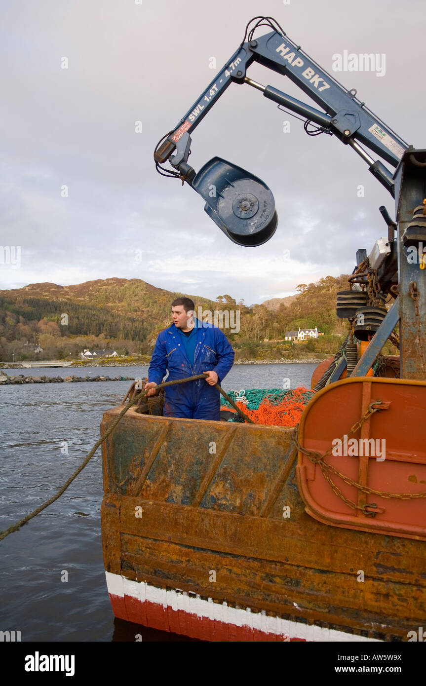 fisherman on boat Stock Photo - Alamy