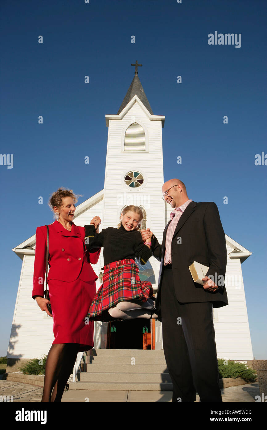 Family excited about church Stock Photo - Alamy