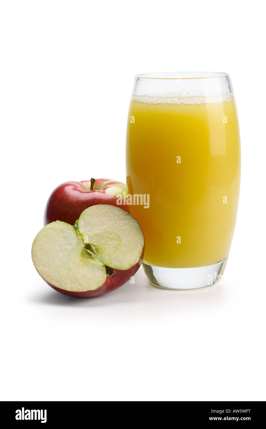 Cloudy apple juice with apples on white background Stock Photo - Alamy