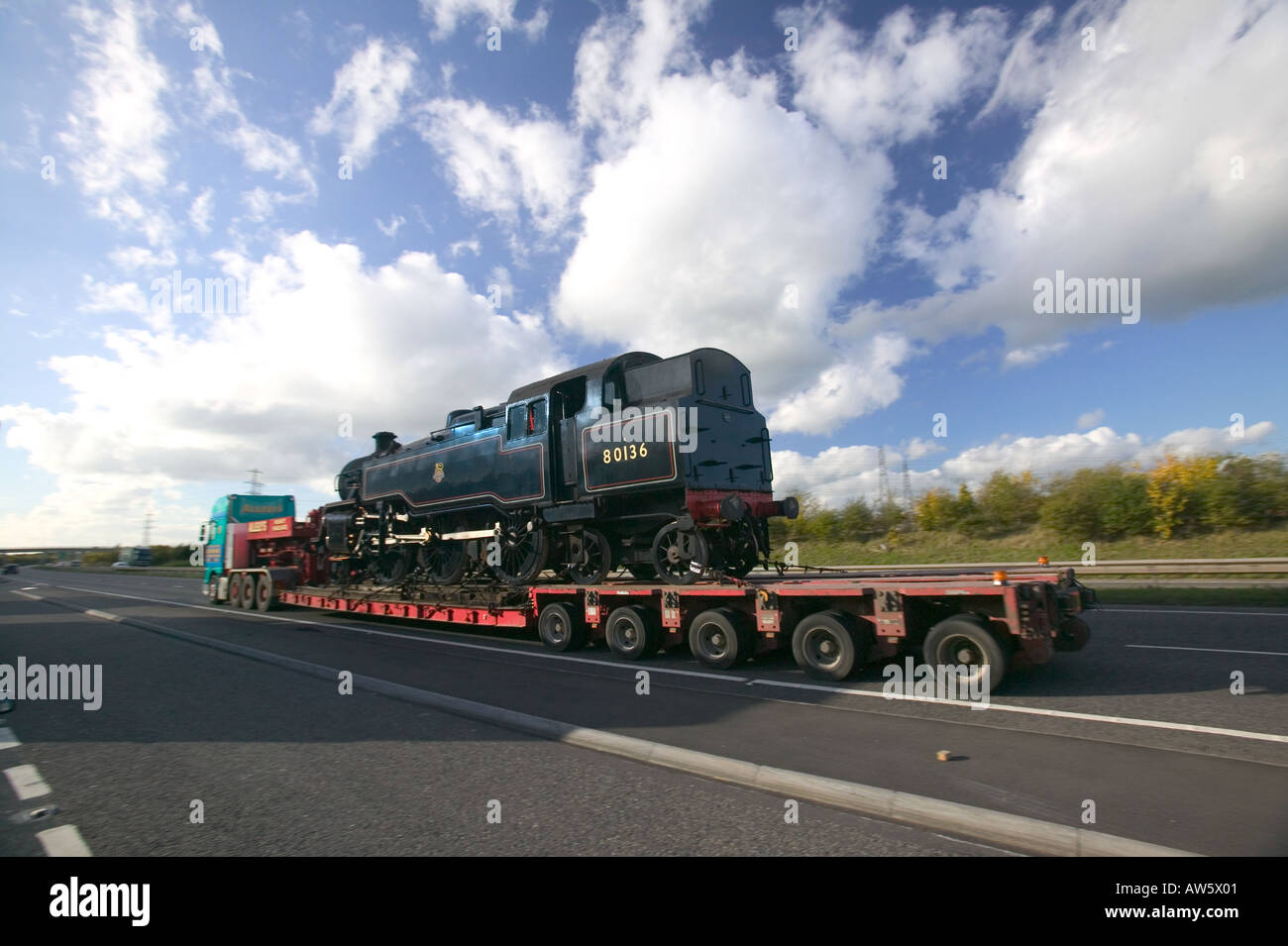 Lorry on low loader hi-res stock photography and images - Alamy