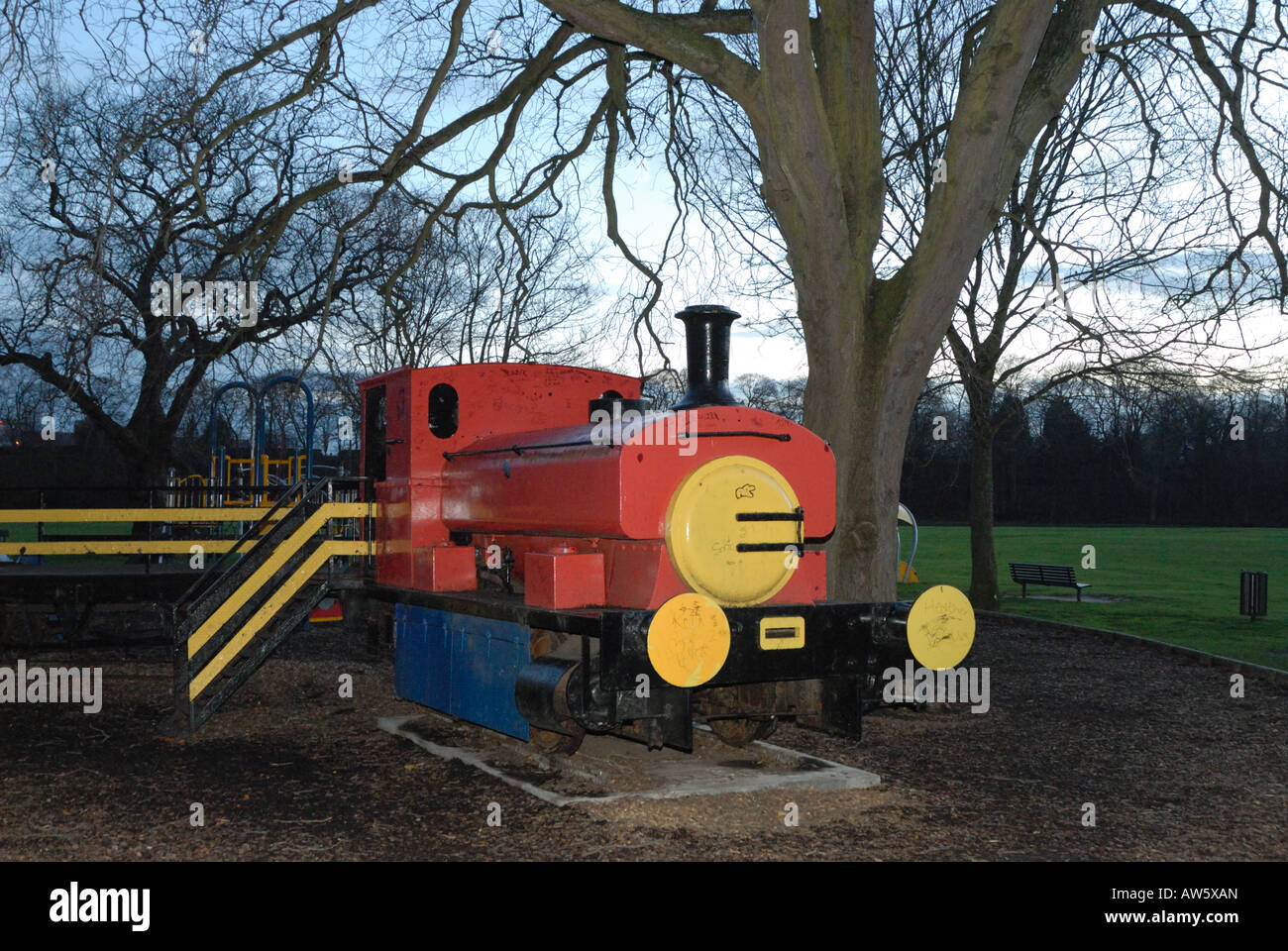 Locomotive in playground at dusk Stock Photo - Alamy