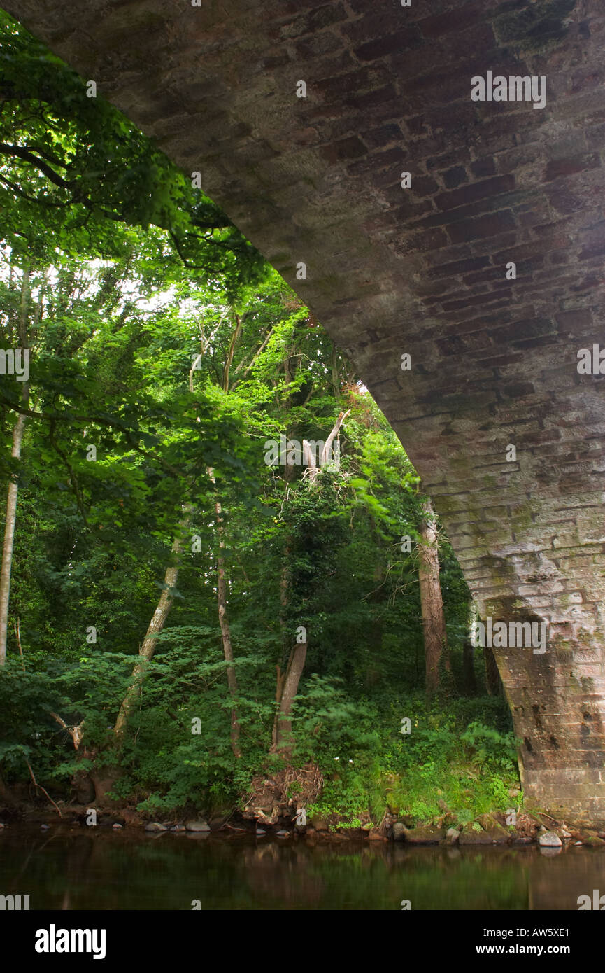 England, Cumbria, Bell Bridge. The stone curve of Bell Bridge and ...