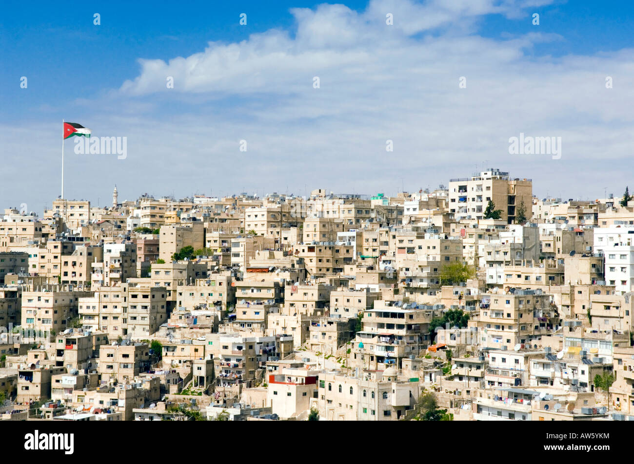 National flag flying over Amman city in Jordan Stock Photo - Alamy