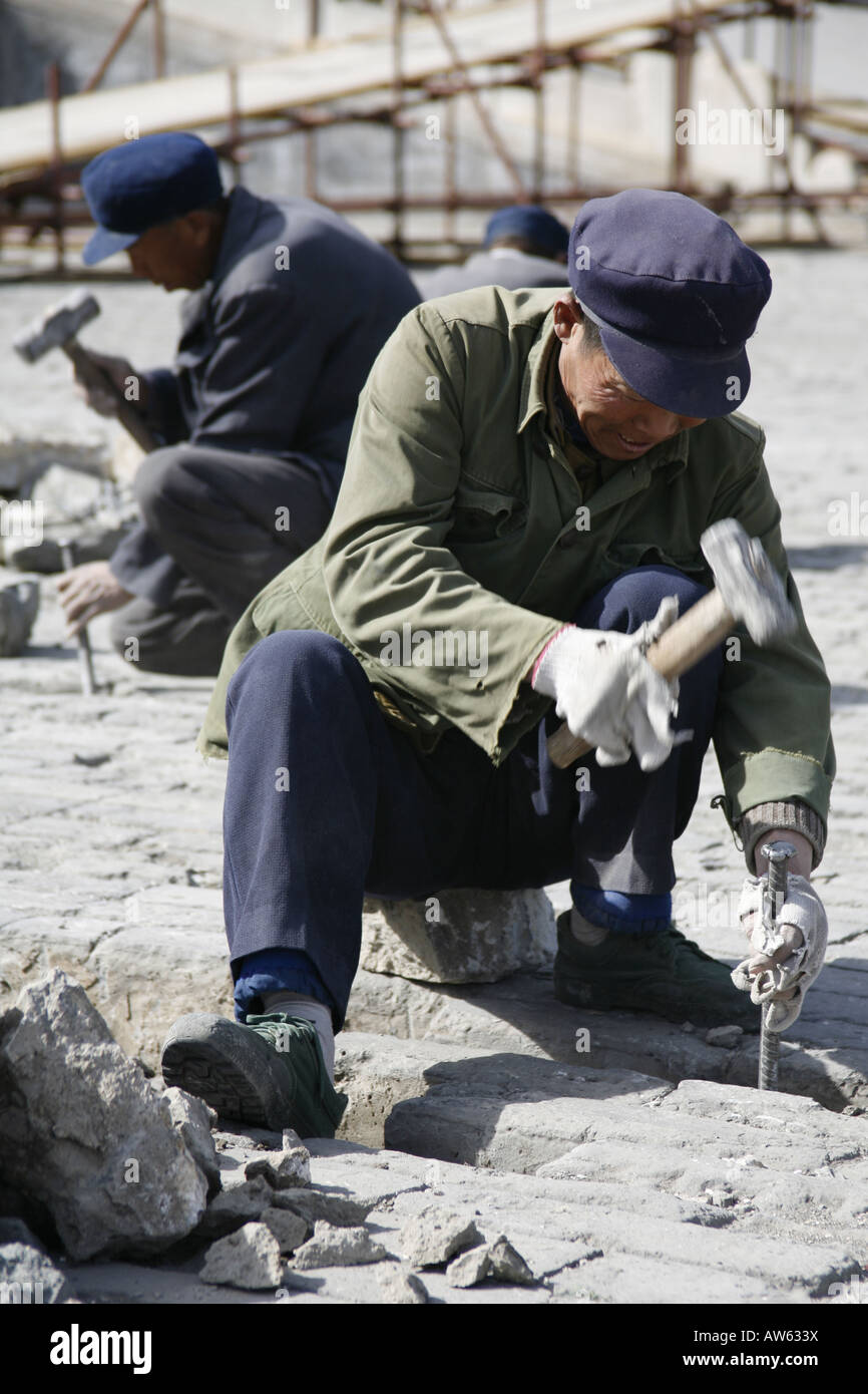 Stonemasons undertake painstaking restoration work in the Forbidden ...