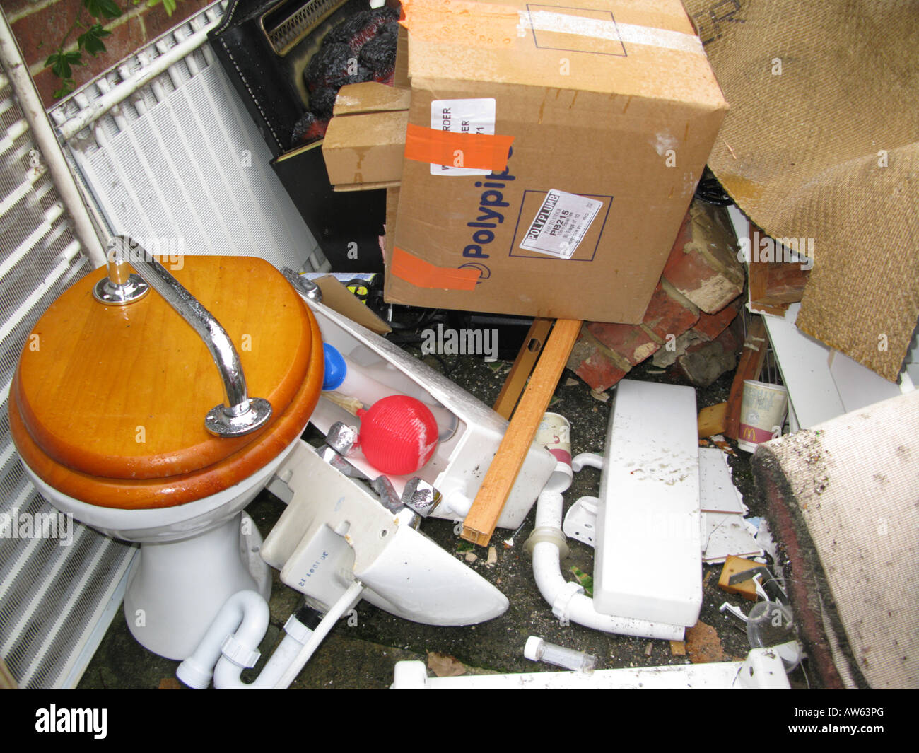 Builders rubble and debris ready for the skip from stripping out a ...