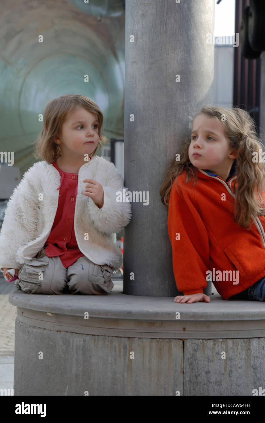 two kids waiting/bored Stock Photo - Alamy