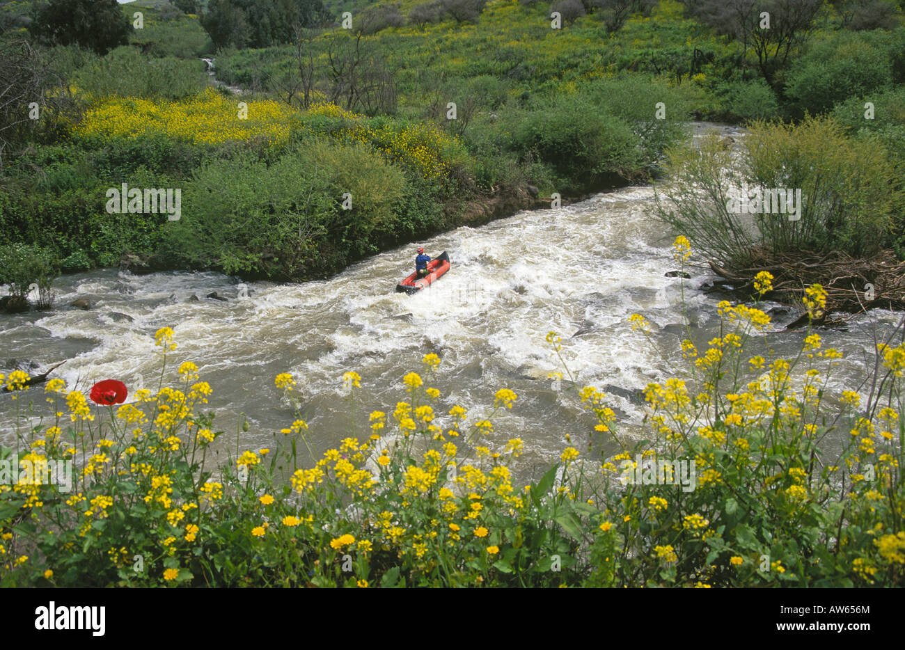 A kayaker enjoys white water rafting on the Jordan River in the Great ...