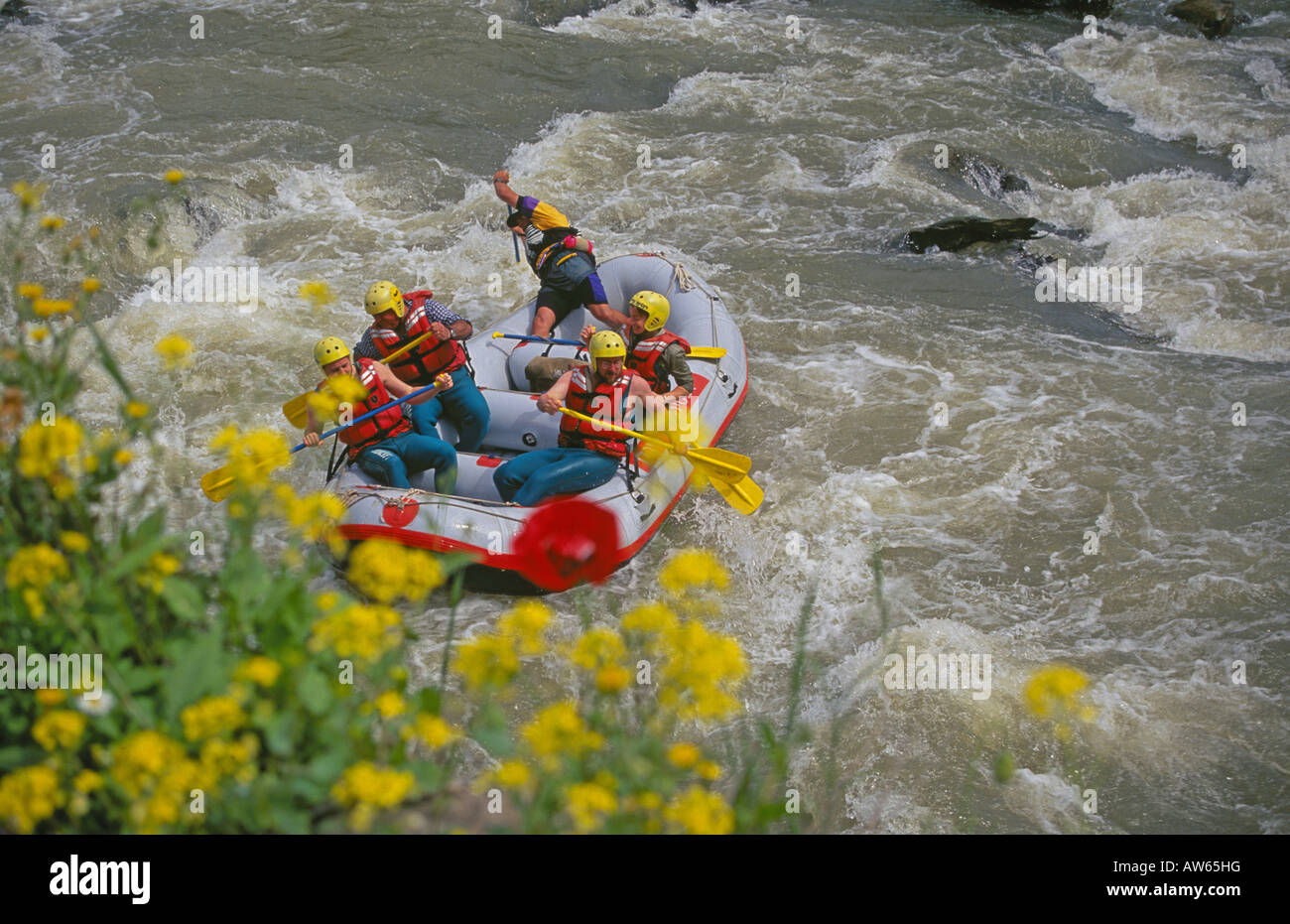 White water rafters ride the white water of the Jordan River in the ...