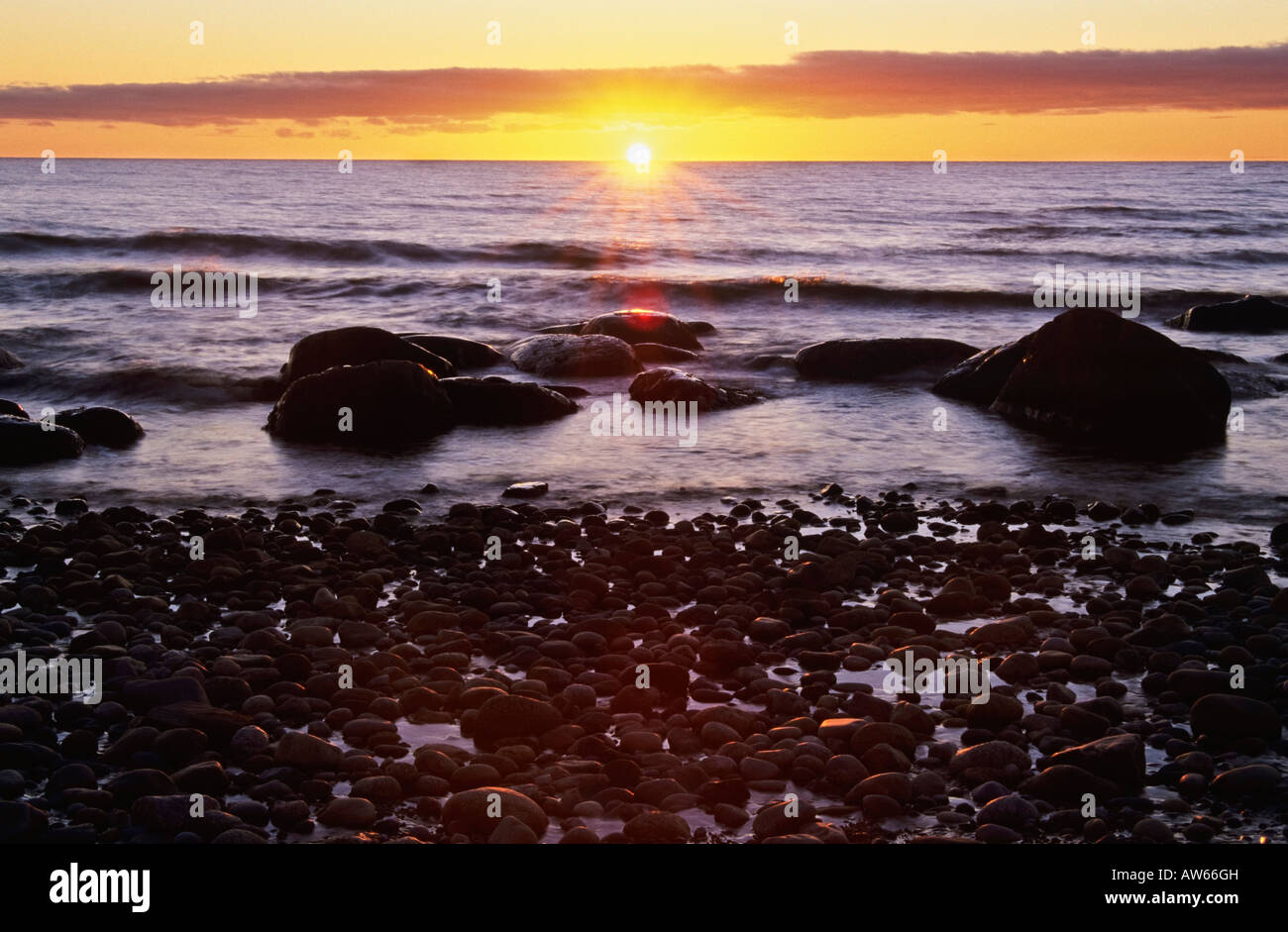 Newfoundland dusk clouds shoreline hi-res stock photography and images ...