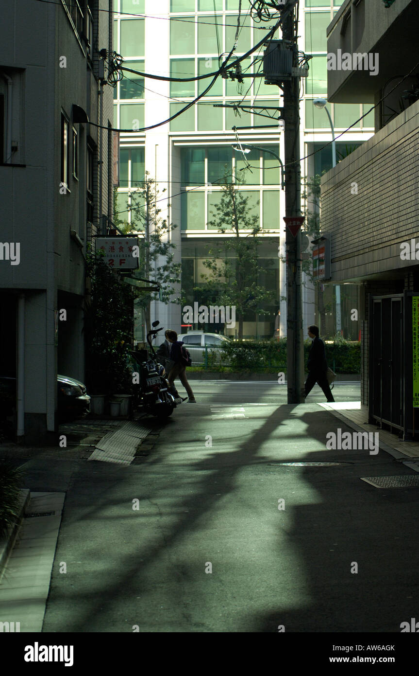 Sunlight and shadows in Tokyo side-street Stock Photo - Alamy