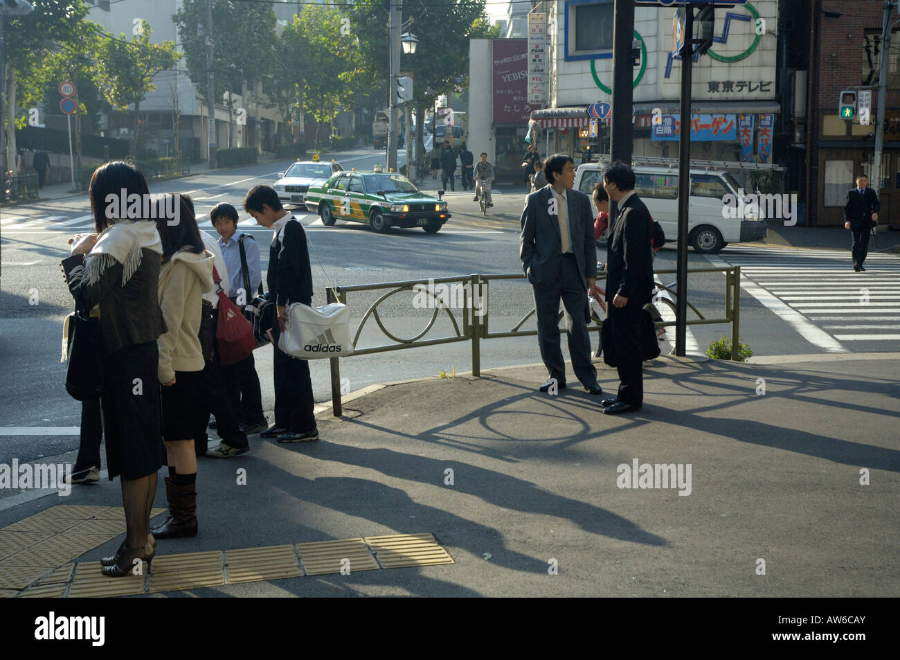 Tokyo street scene with morning commuters Stock Photo - Alamy