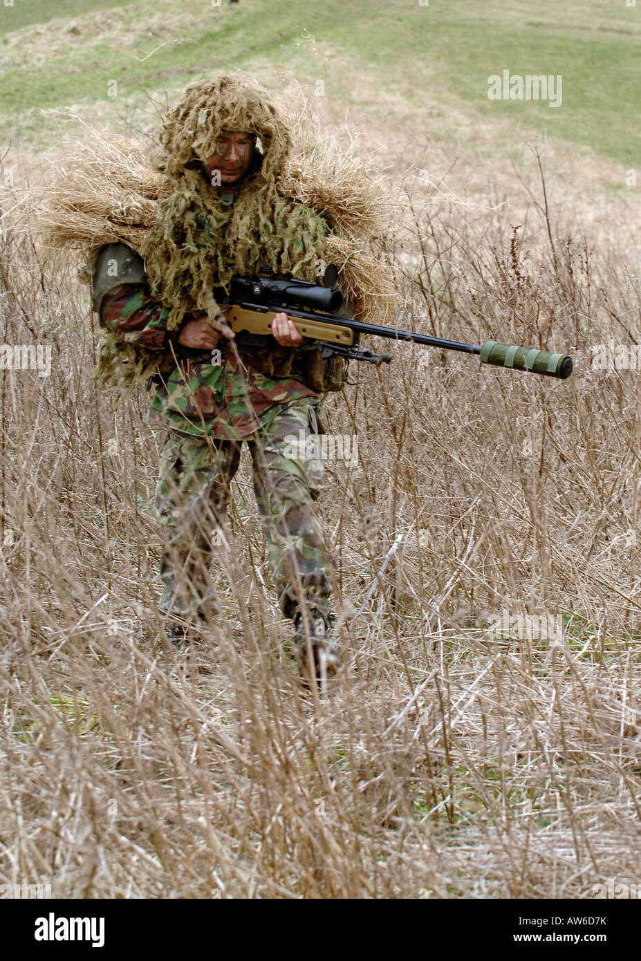 British Infantryman with a long range sniper rifle L115A3 which has a ...