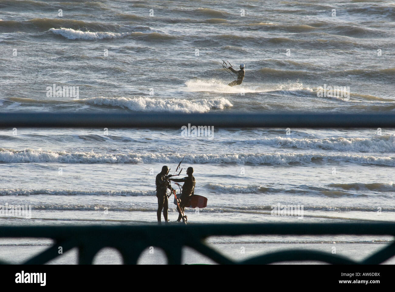 Winter Seaside Scene Kite Surfers talking Stock Photo - Alamy